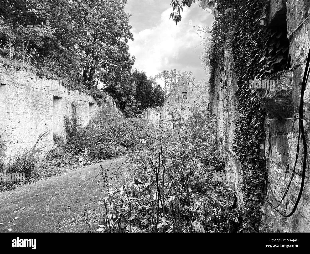 Inside of the relics of a Tudor tithe barn destroyed during the English ...