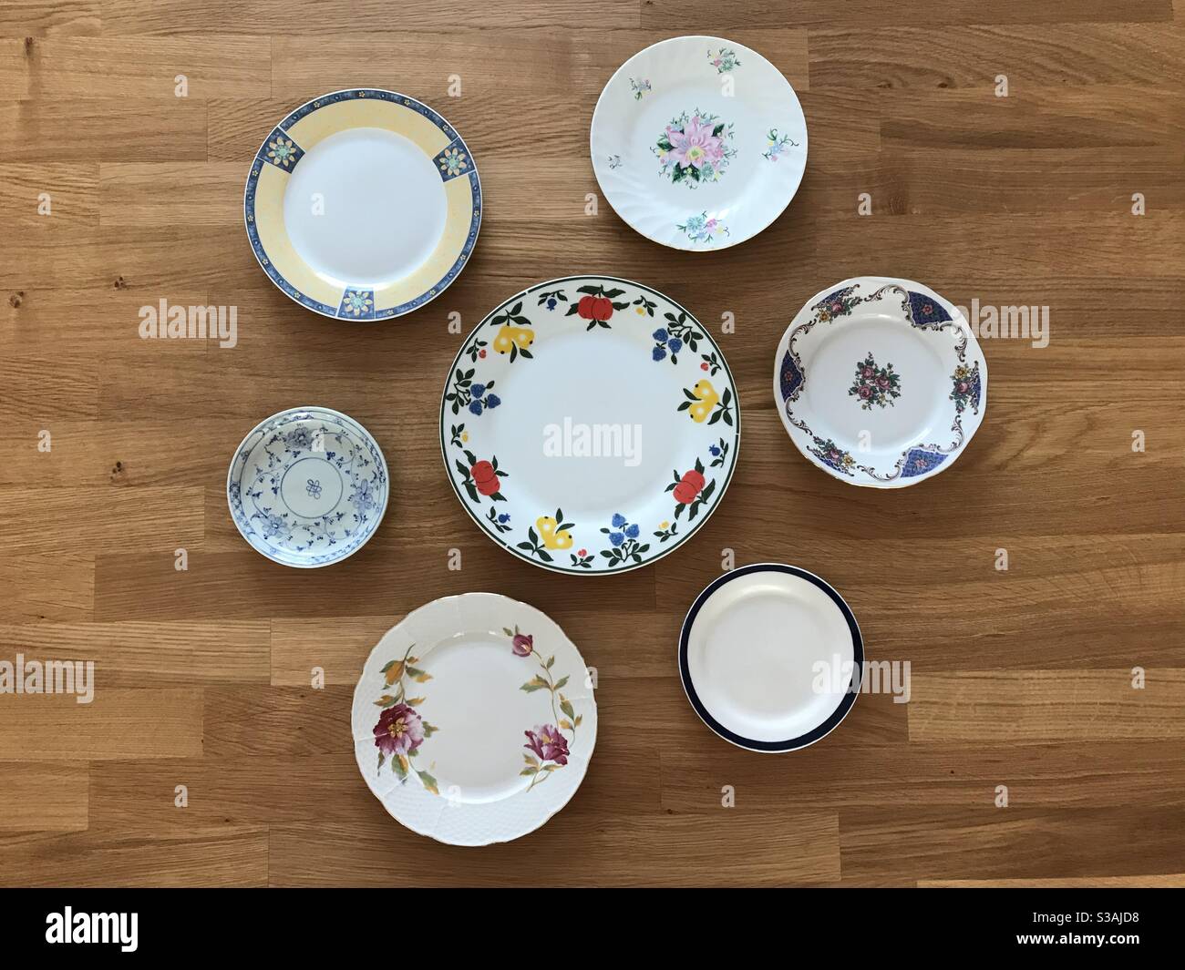 Set of Seven Various Plates Stock Photo - Alamy