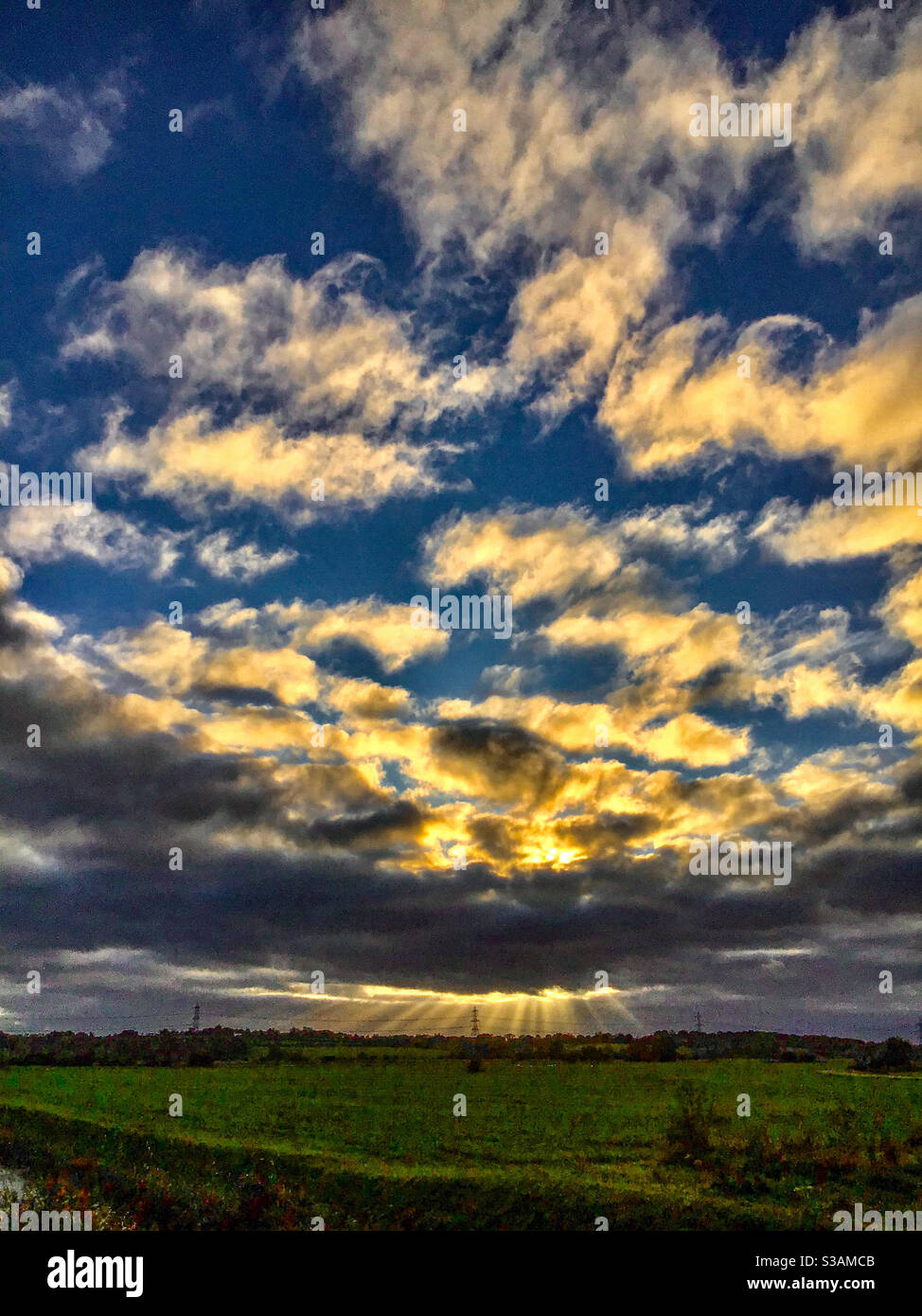 Sun rays clouds hi-res stock photography and images - Alamy