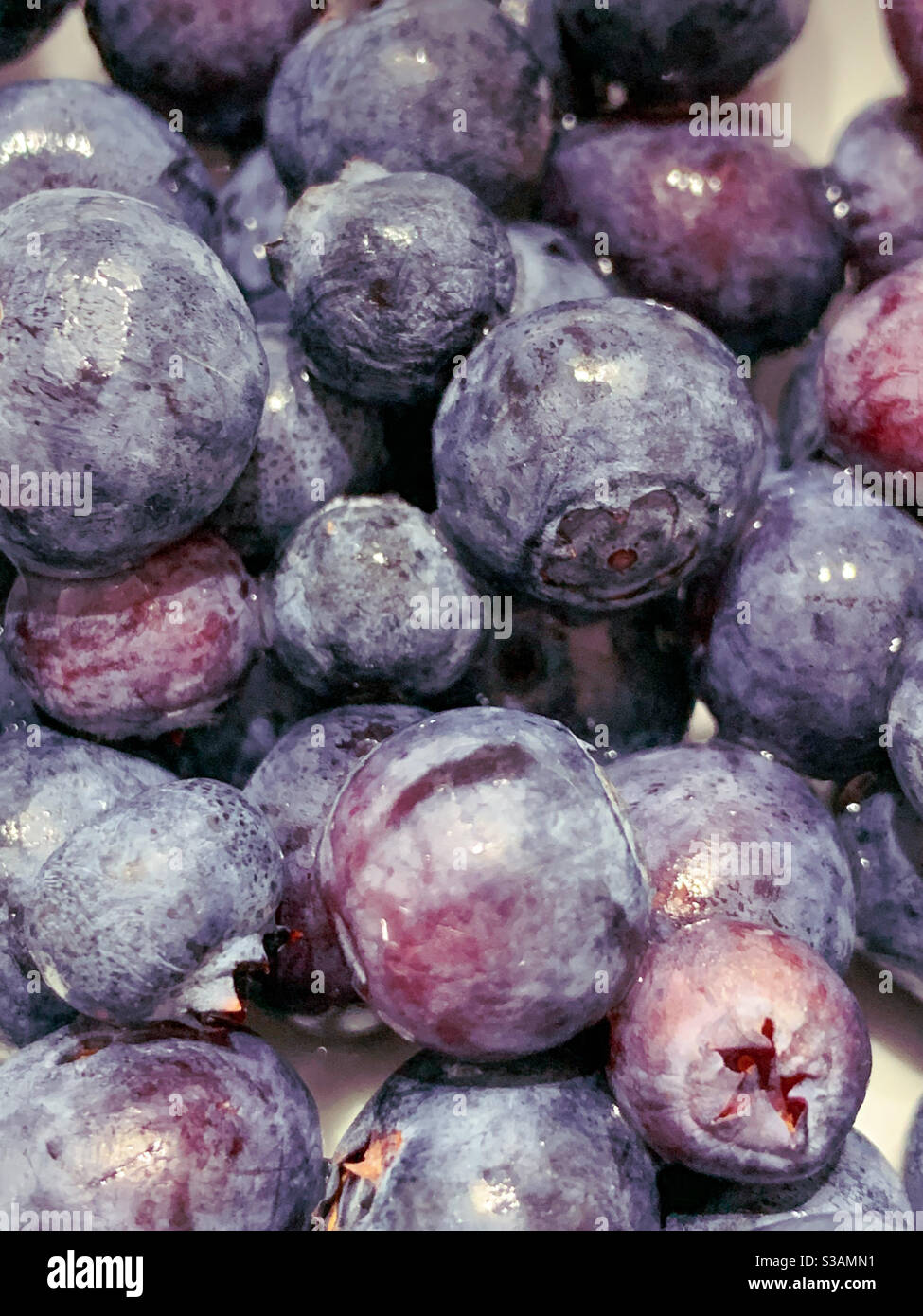 Fruit, food, Closeup on a bowl of fresh healthy purple coloured ...