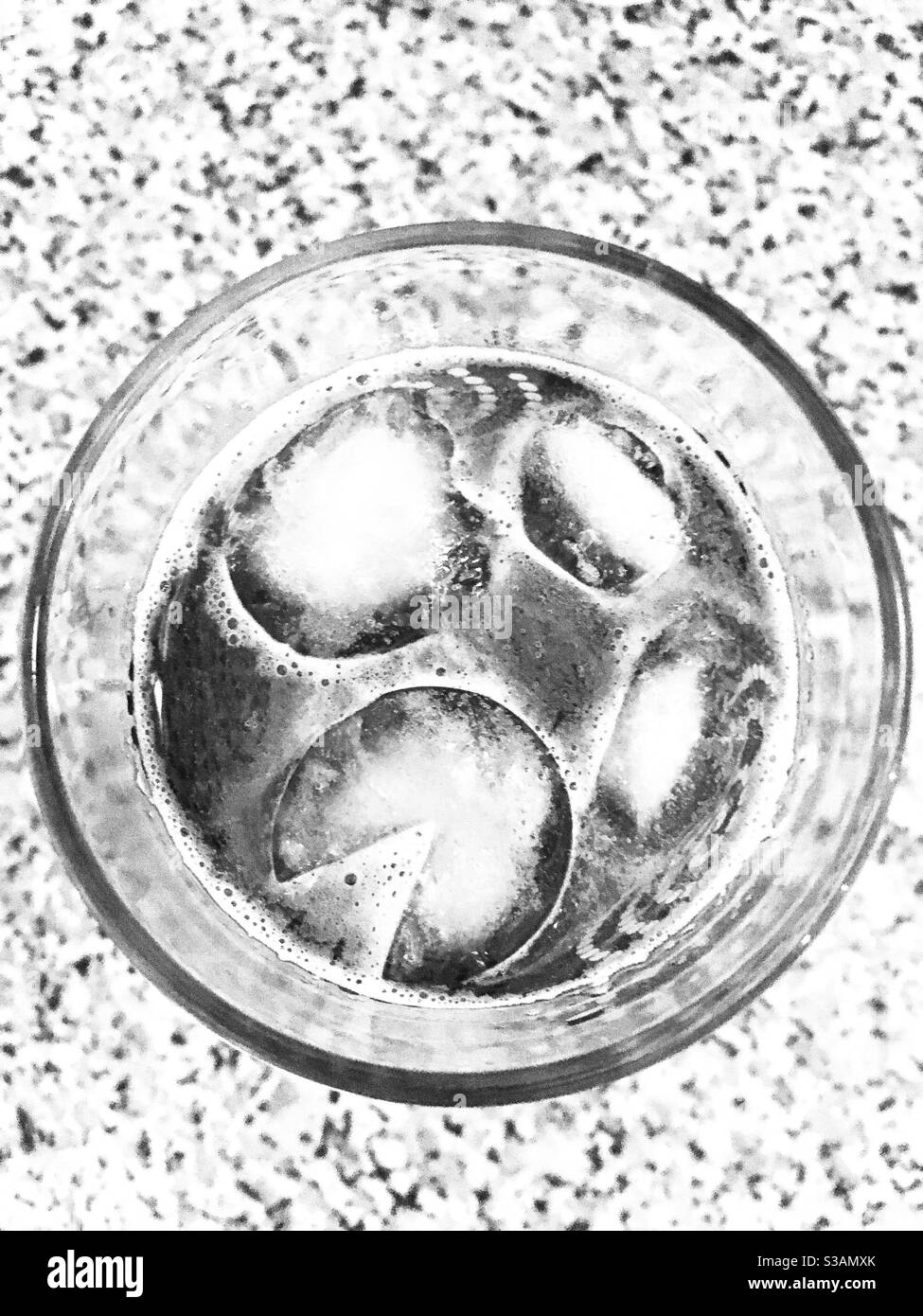 Ice cubes in a glass Stock Photo - Alamy