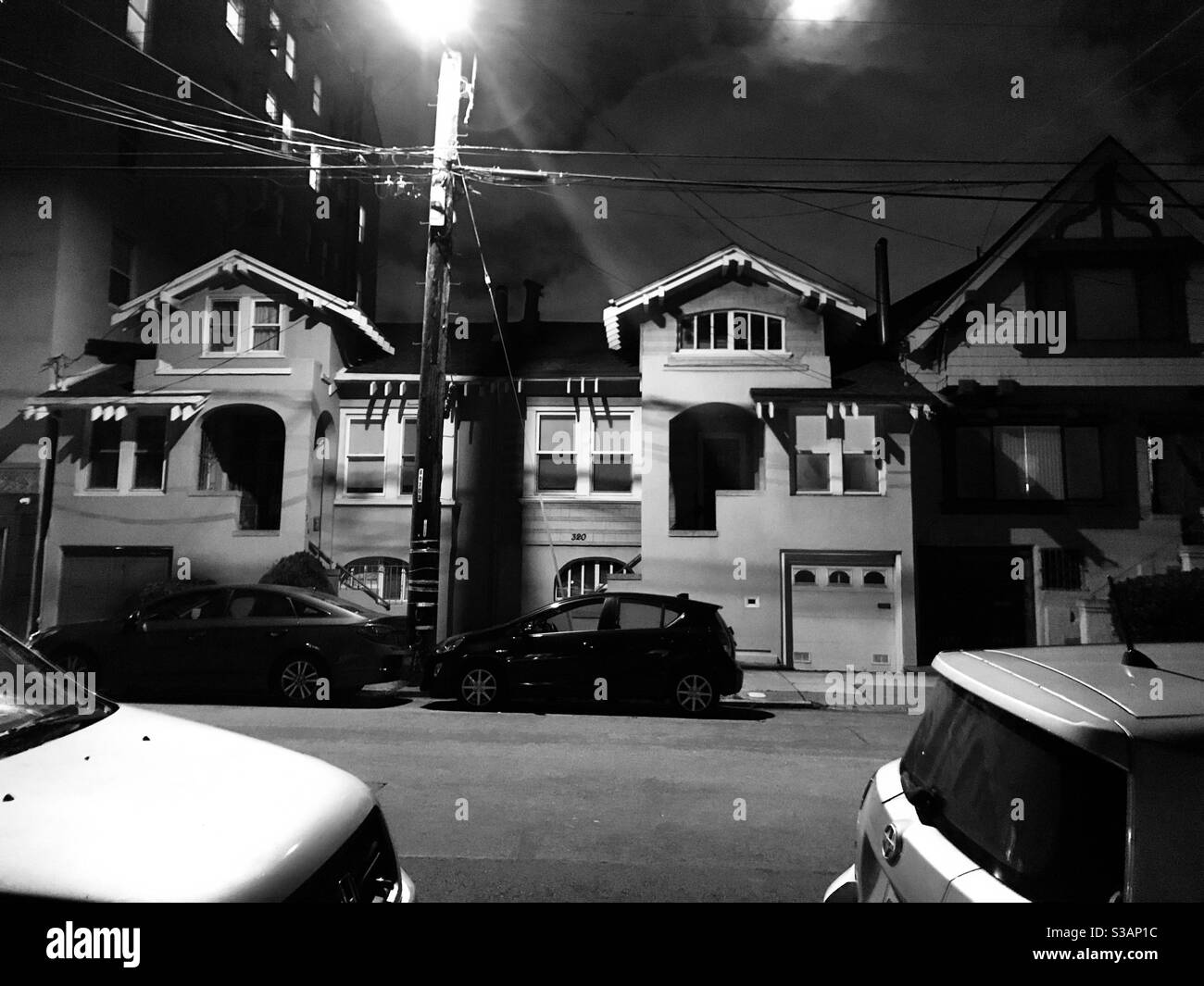 Neighborhood street houses power lines hi-res stock photography and ...