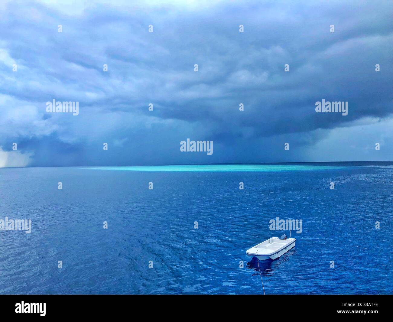 Maldives storm hi-res stock photography and images - Alamy