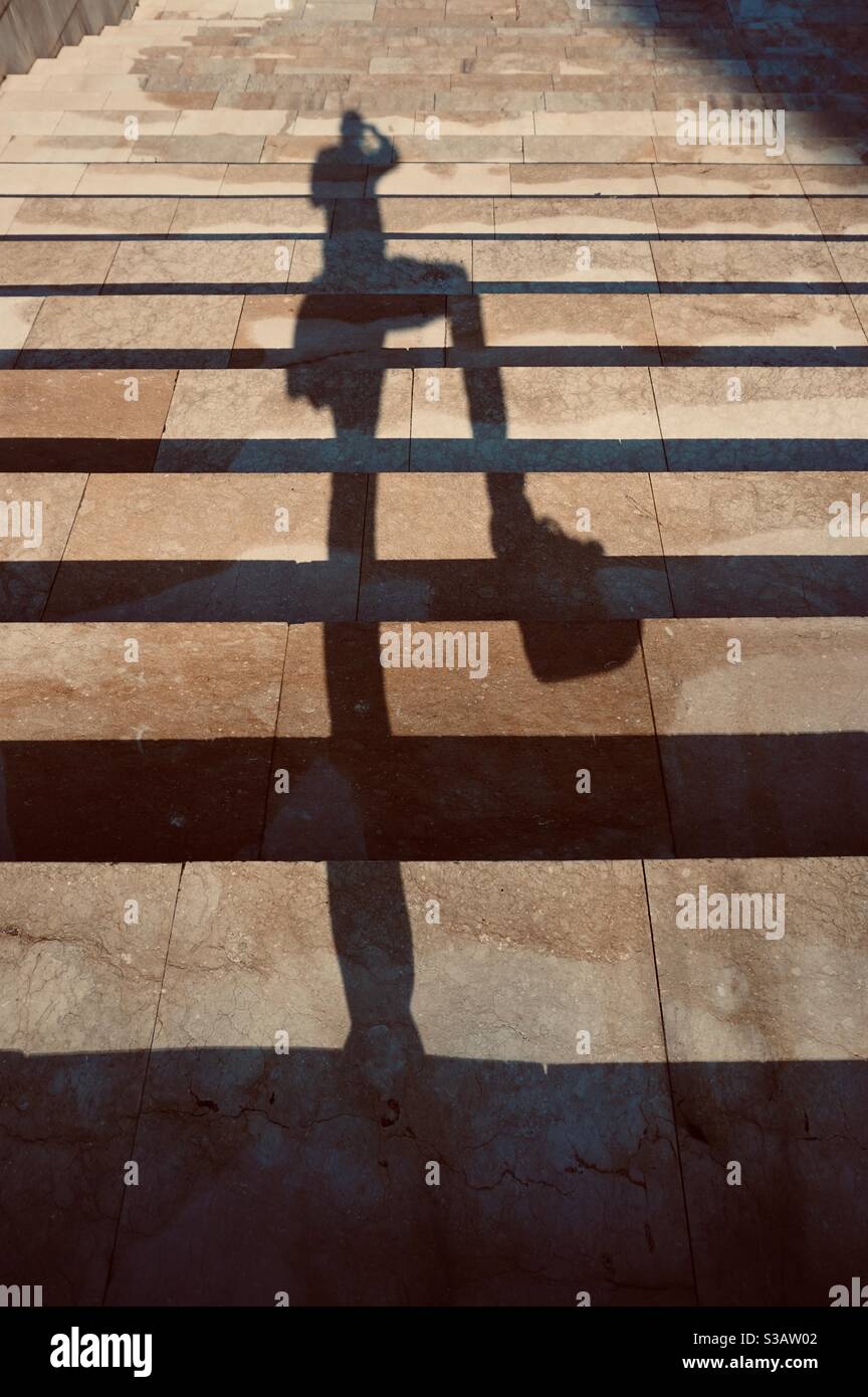 Shadow man stairs hi-res stock photography and images - Alamy