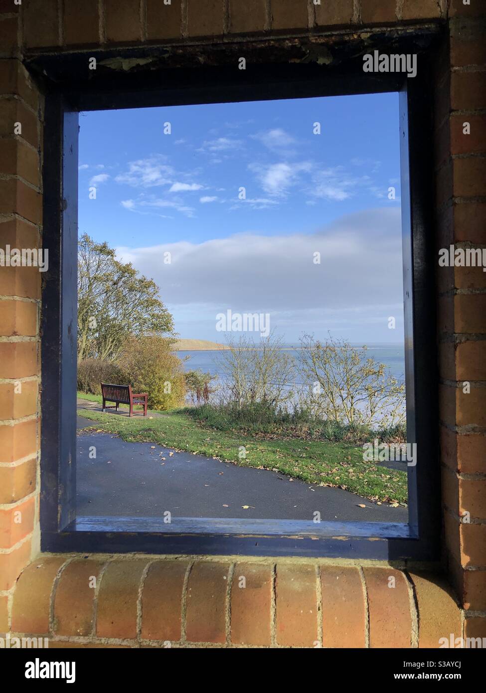 Sea view through a window frame Stock Photo - Alamy