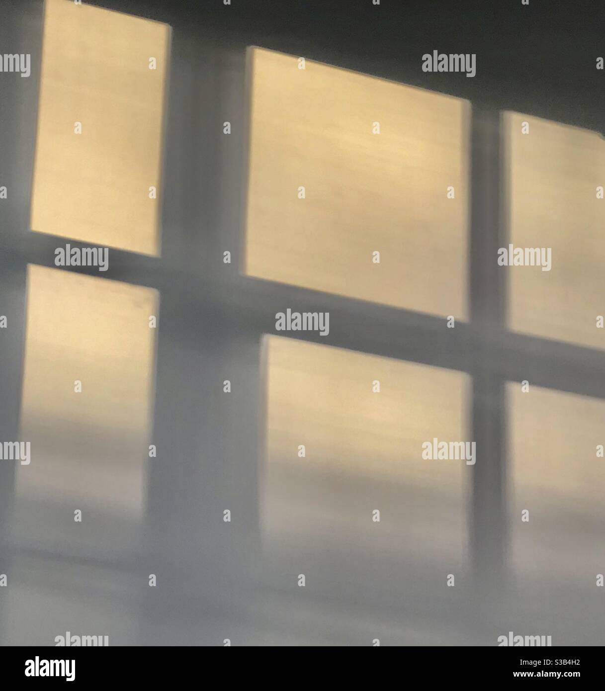 Sunset shadows through a window Stock Photo - Alamy