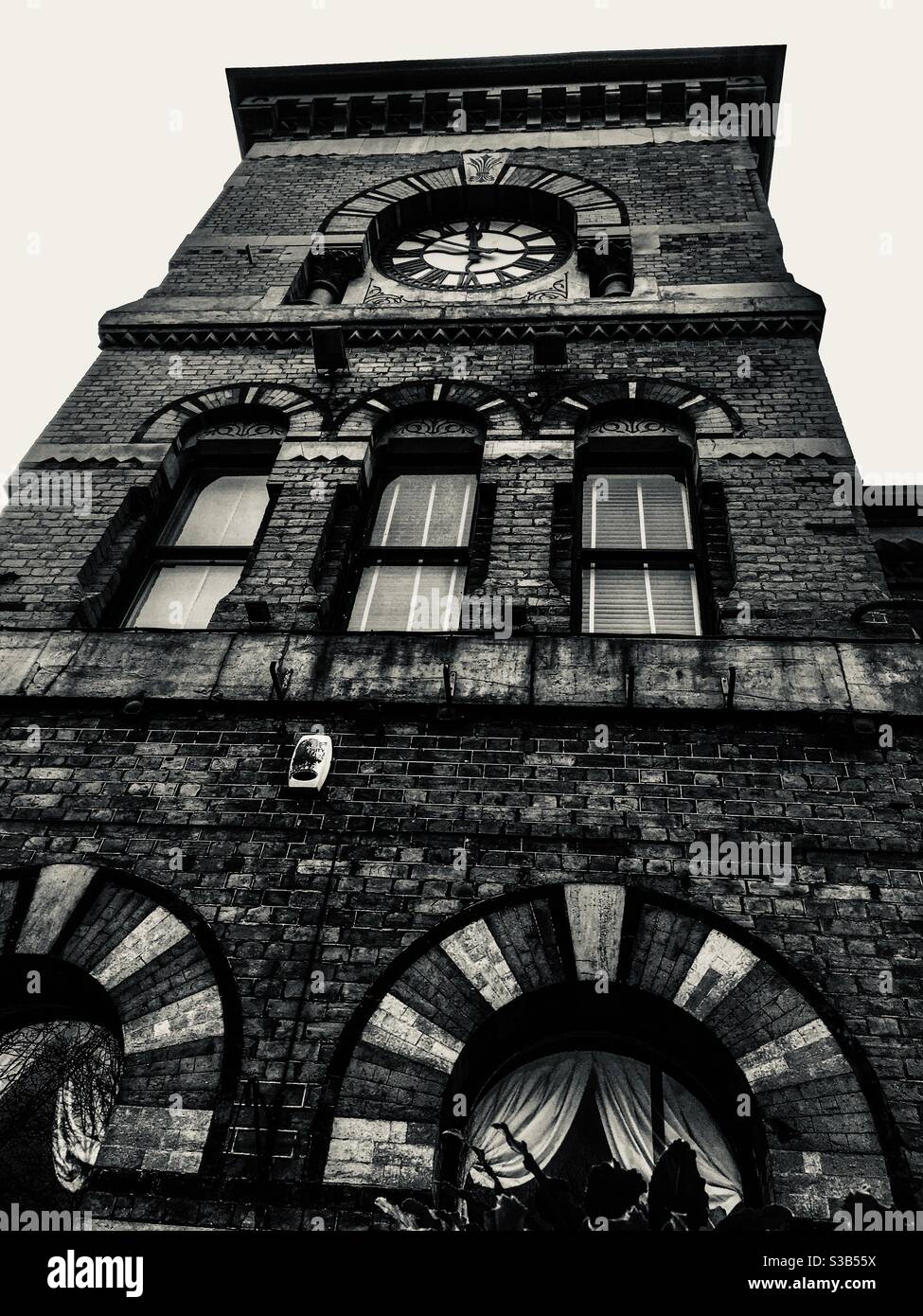 Station clock tower in monochrome Stock Photo - Alamy