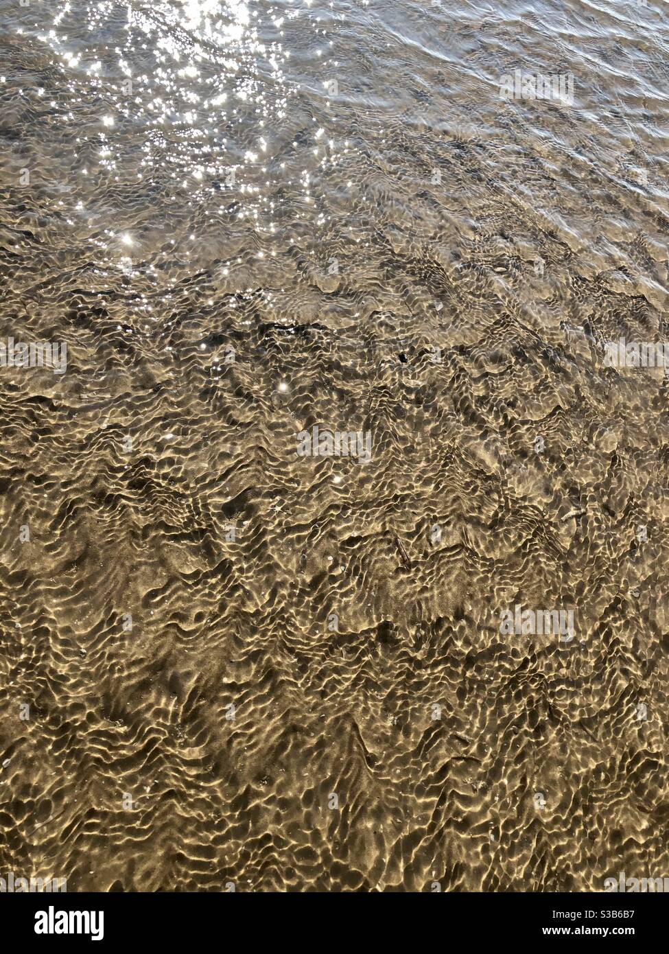 Shallow water beach hi-res stock photography and images - Alamy