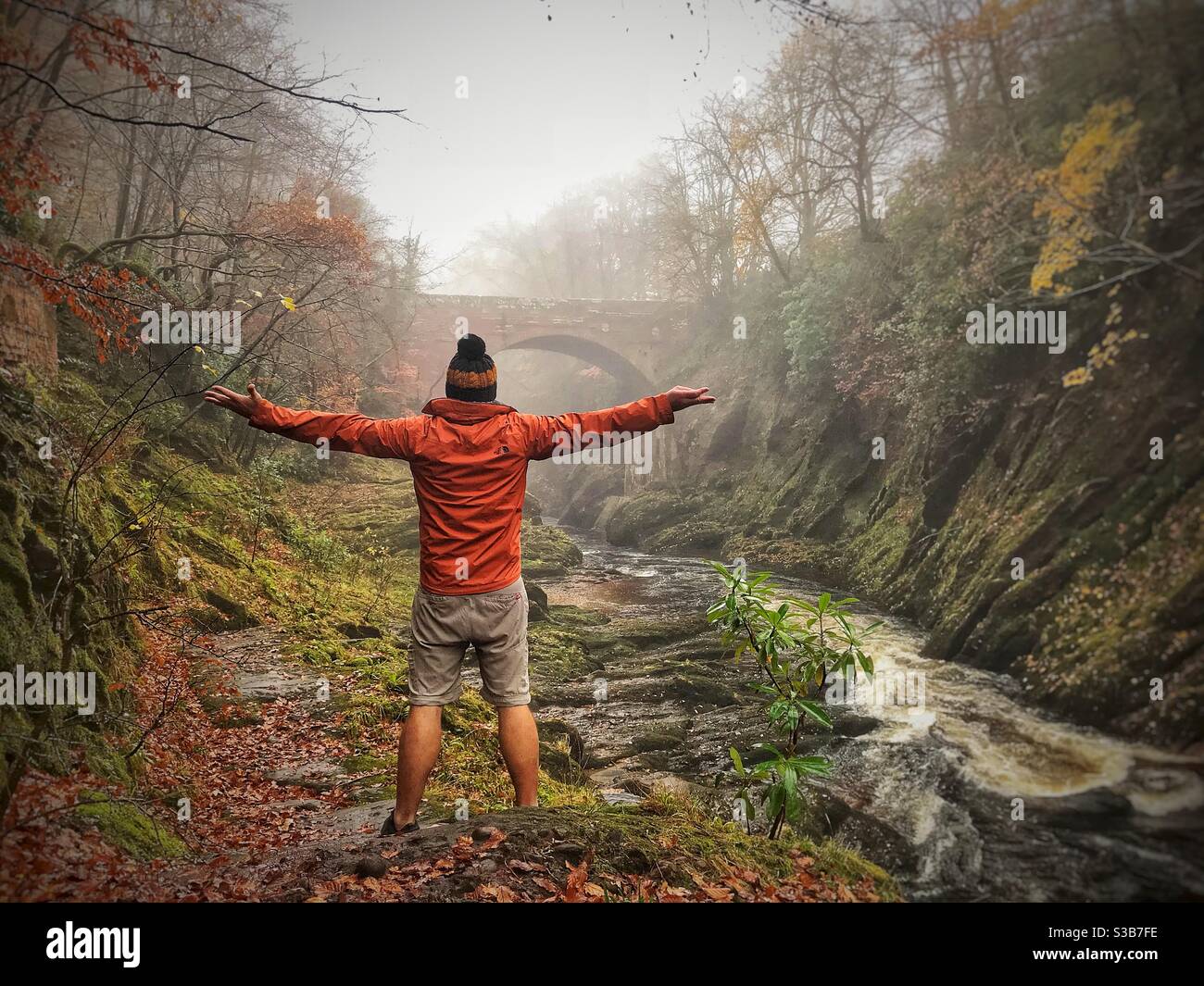 Man Standing Arms Stretched Out High Resolution Stock Photography and ...