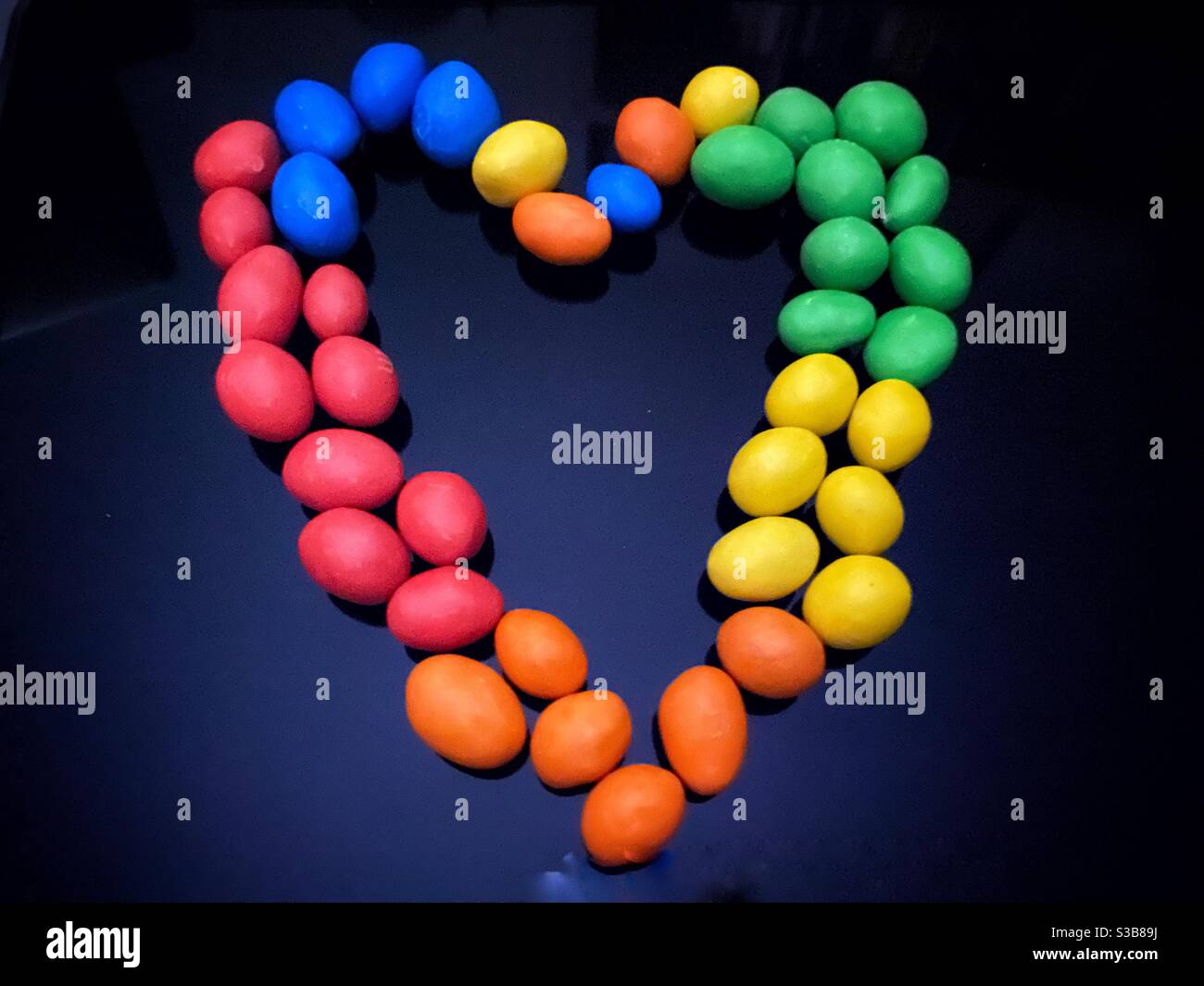 Heart made out of sweets Stock Photo - Alamy