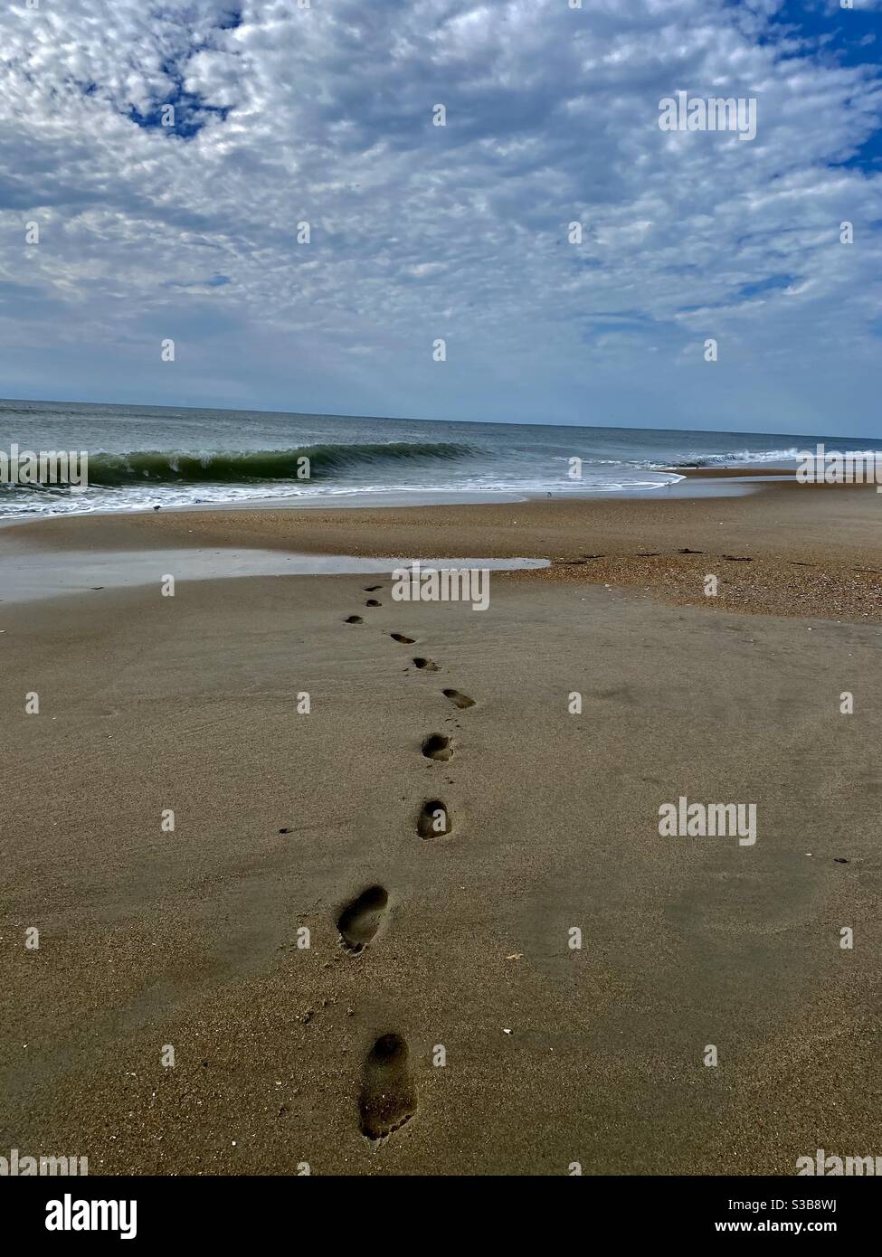 Footprints into the surf hi-res stock photography and images - Alamy