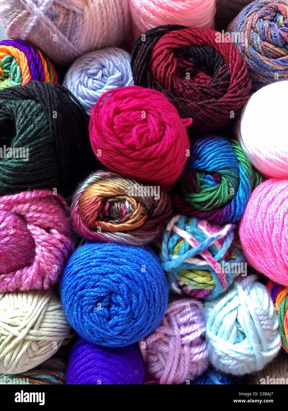 Full frame of assorted colorful yarns Stock Photo - Alamy