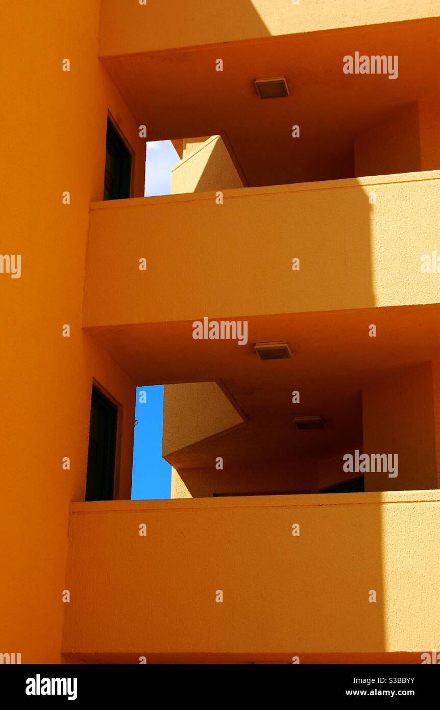 Modern building in light and shade - yellow version Stock Photo - Alamy