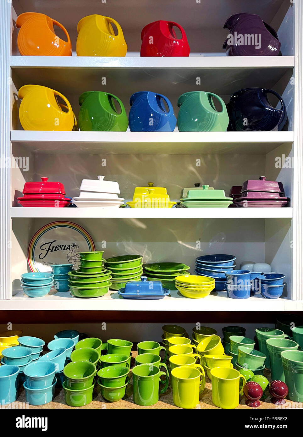 Colorful ceramic on store shelf Stock Photo - Alamy