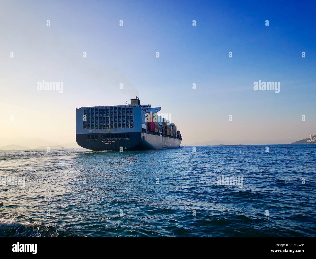 The GSL Ningbo Monrovia container ship crossing the East Lamma channel ...