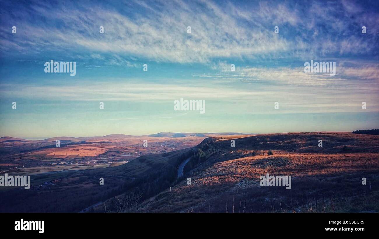 A photograph of a landscape view over South Wales from the Rhigos ...