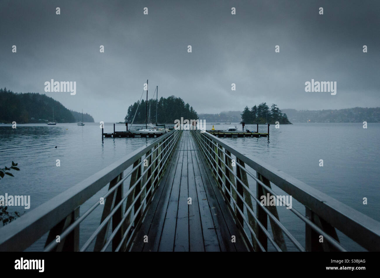 Dock in the rain, British Columbia, Canada Stock Photo - Alamy