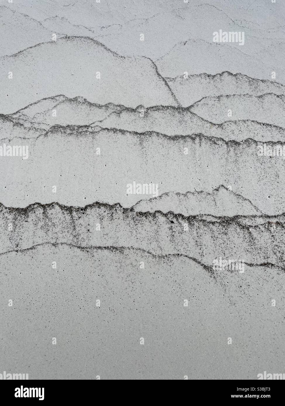 Silt on the sand looks like drawing of mountain ranges hi-res stock ...
