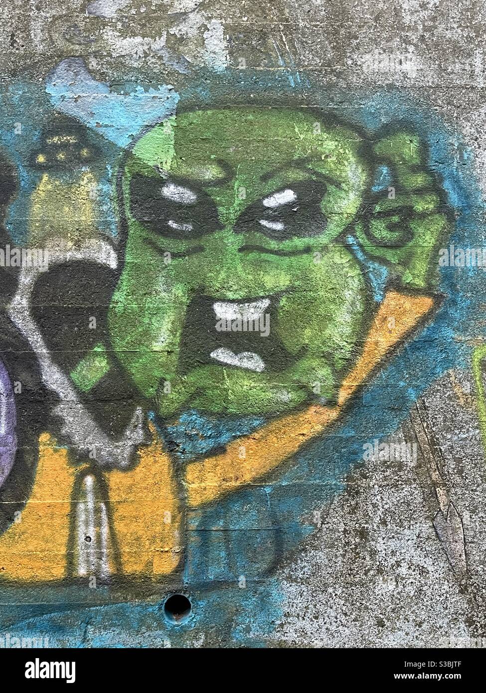 Comic design on street wall Stock Photo - Alamy