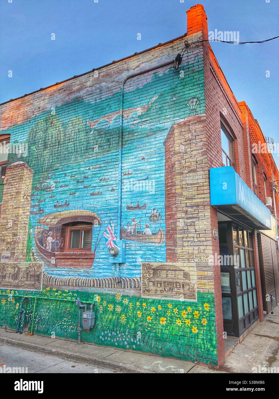 Historical mural painted on a brick wall in a Toronto neighbourhood ...