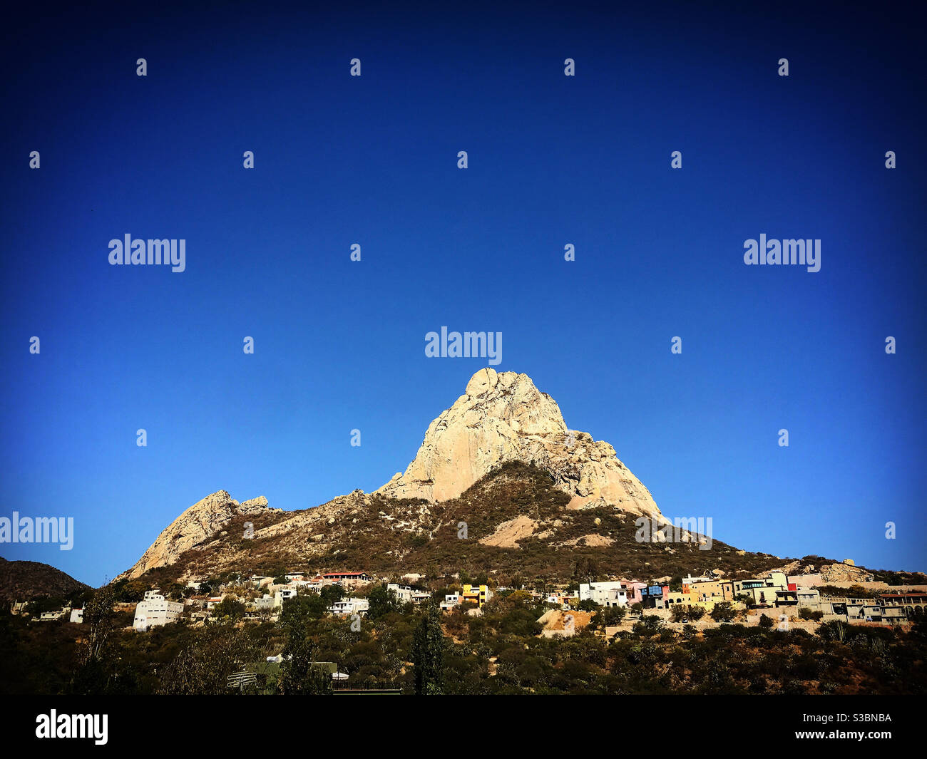 The Peña de Bernal monolite in Queretaro, Mexico Stock Photo - Alamy