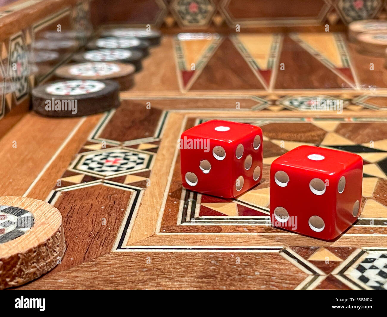 Backgammon board game and dice Stock Photo - Alamy
