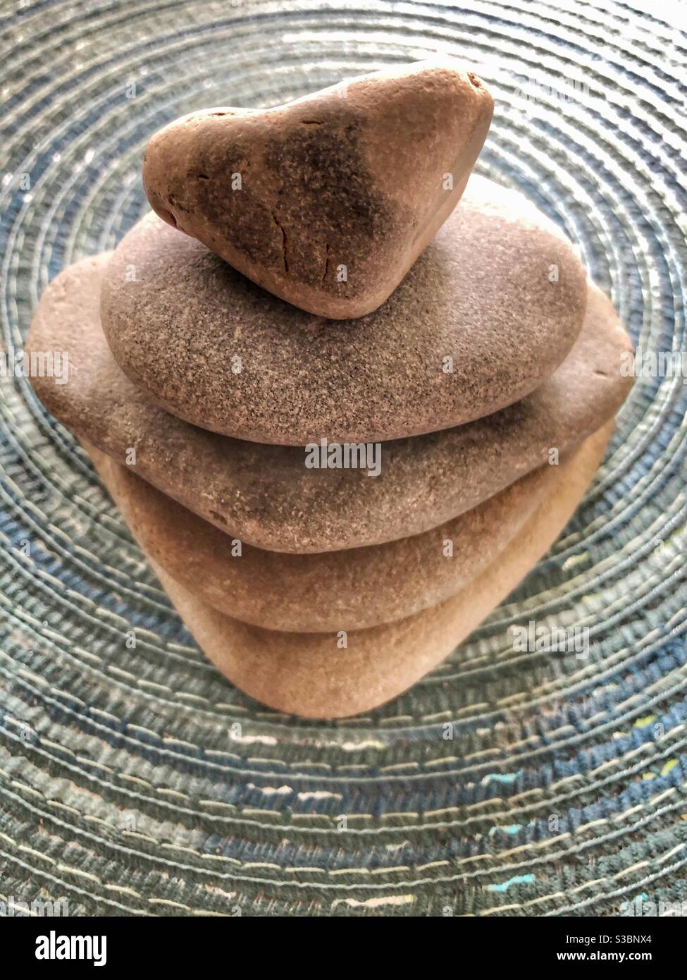 Stacked rocks creating a heart pyramid Stock Photo - Alamy