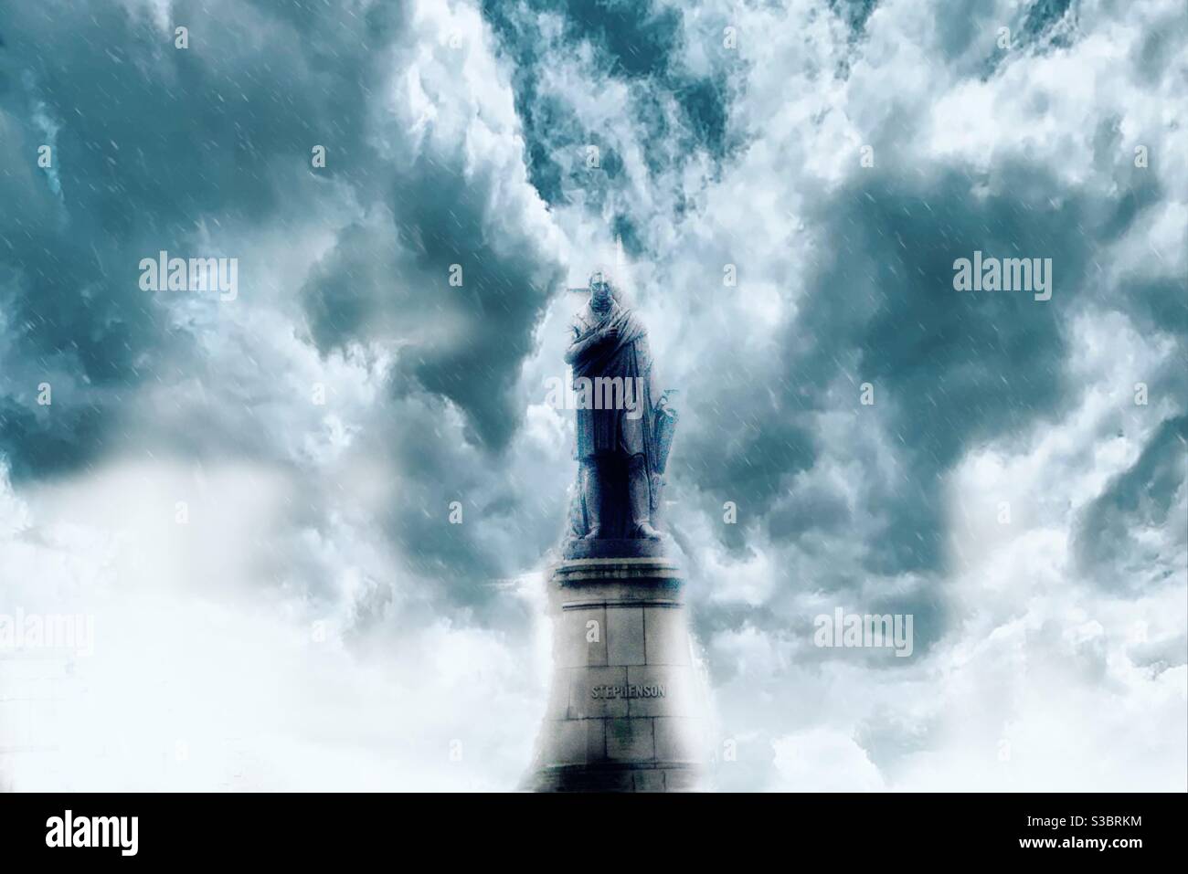 Statue with dramatic clouds Stock Photo - Alamy