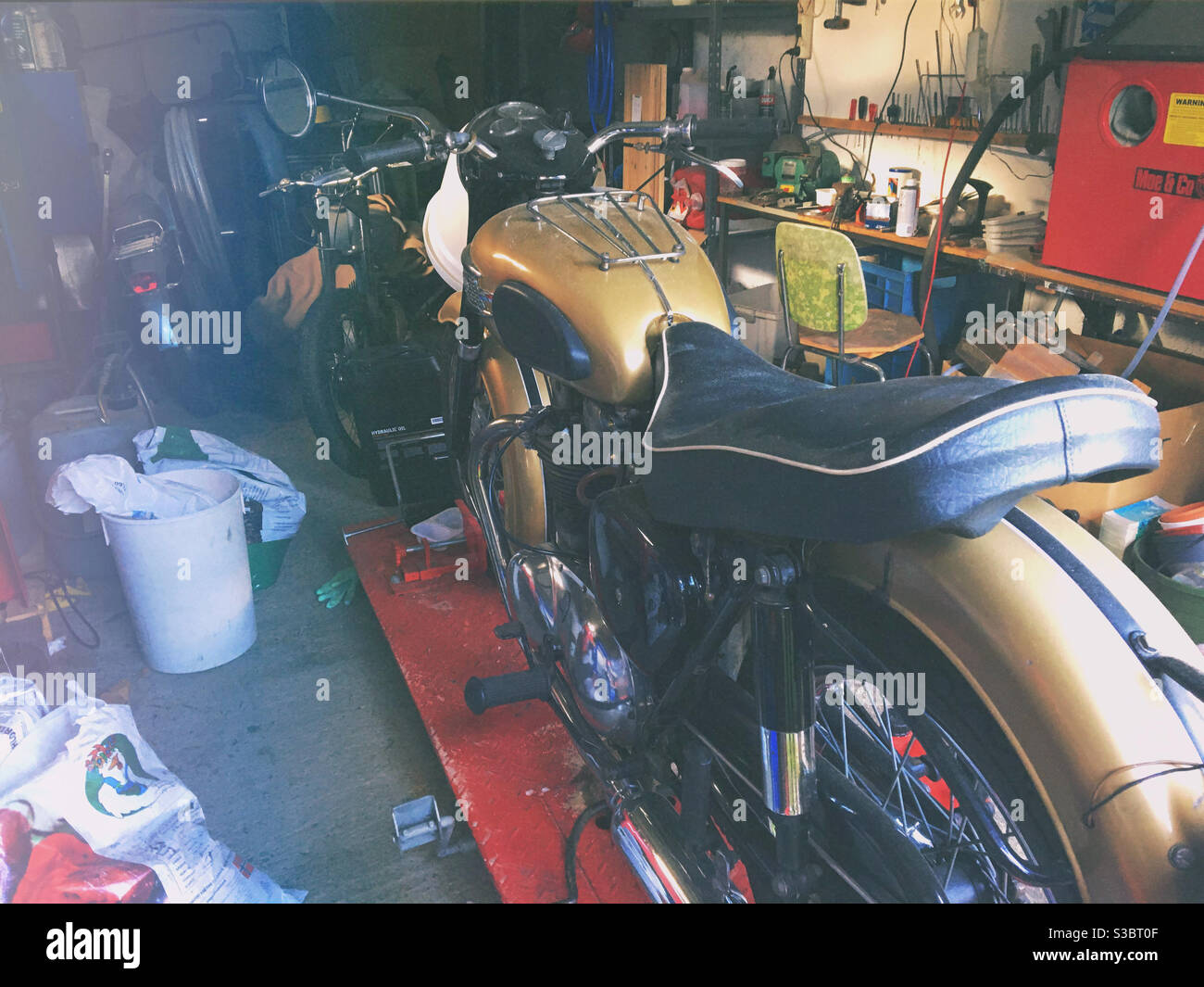 Old Triumph motorcycle restoration Stock Photo - Alamy