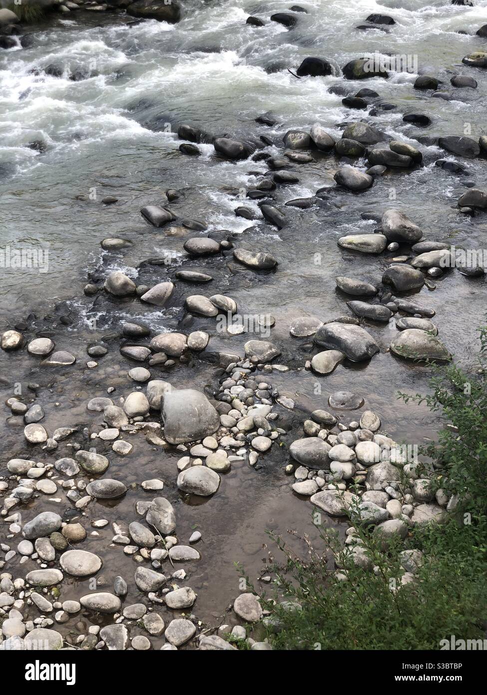 River flow with rocks hi-res stock photography and images - Alamy