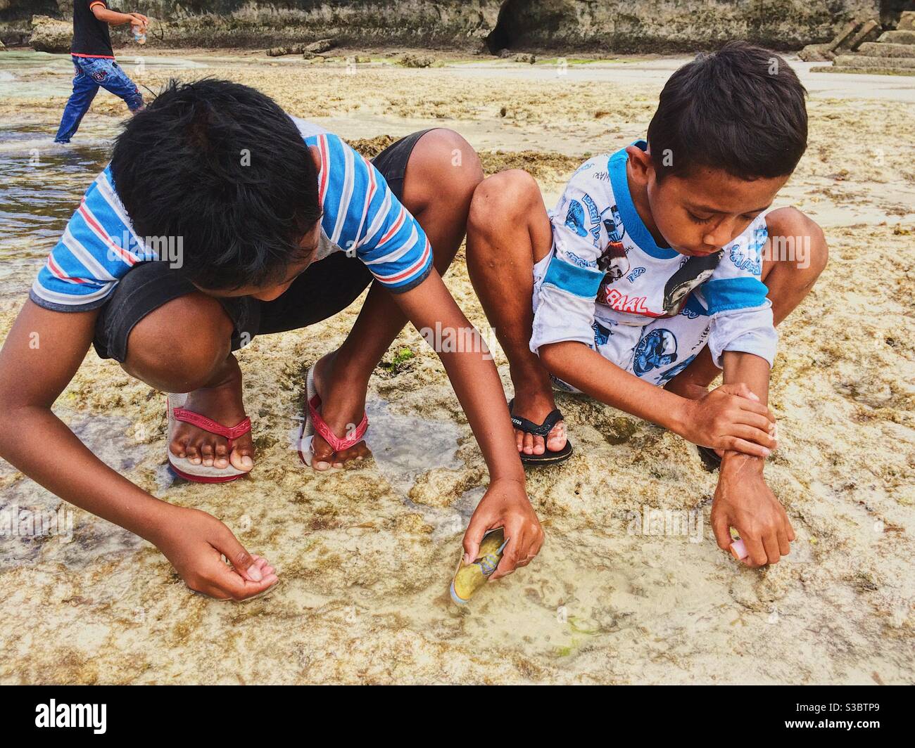 Kids of a thousand islands Stock Photo - Alamy