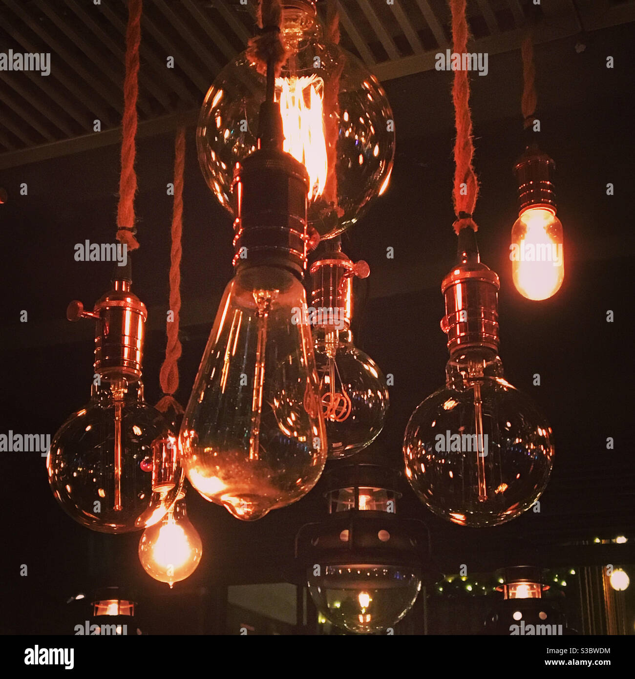 Hanging lightbulbs hi-res stock photography and images - Alamy