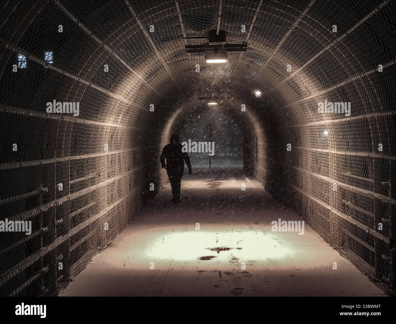 Pedestrian crossing a bridge over the Prospect parkway in Brooklyn, NY ...