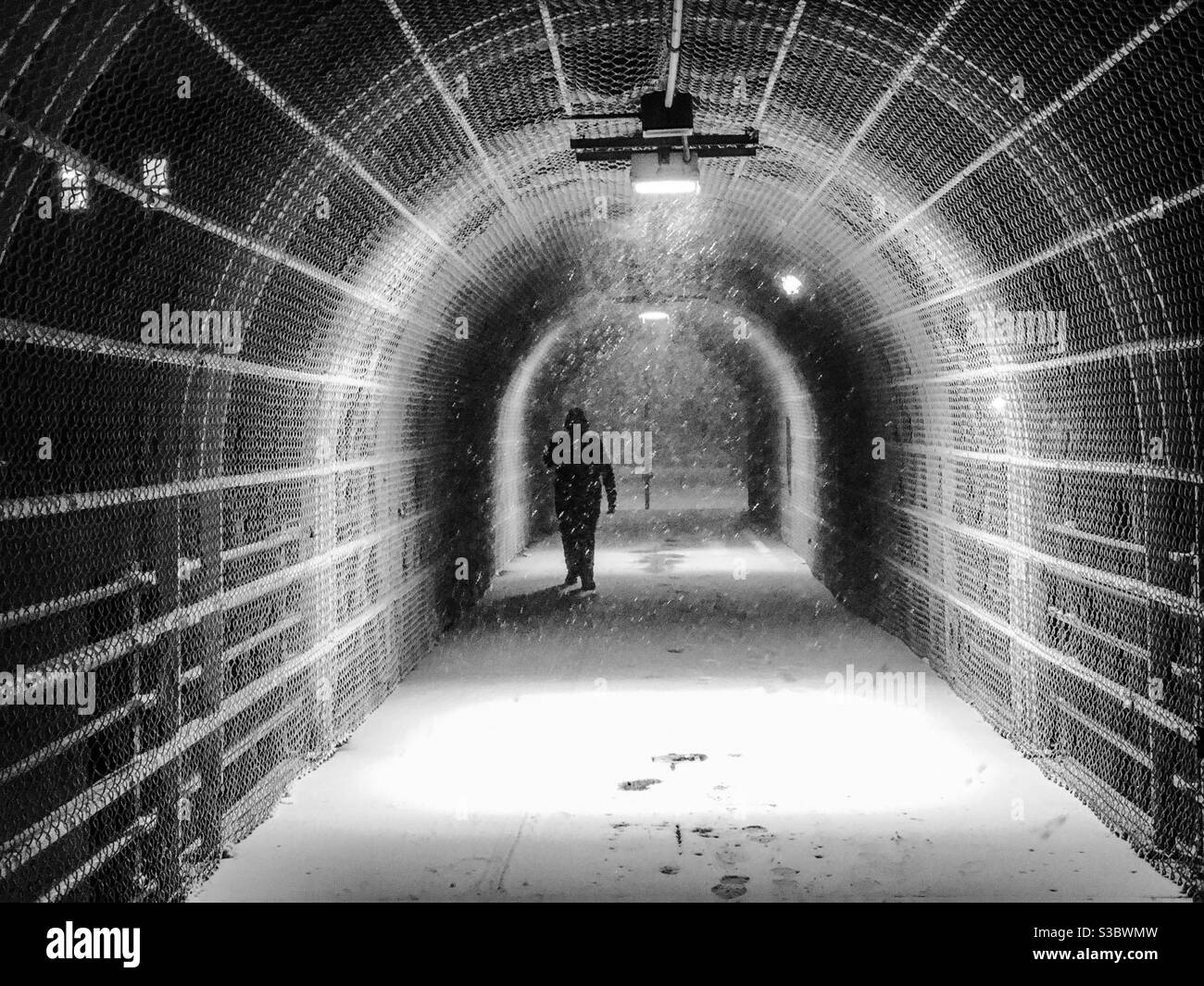 Pedestrian crossing a bridge over the Prospect parkway in Brooklyn, NY ...
