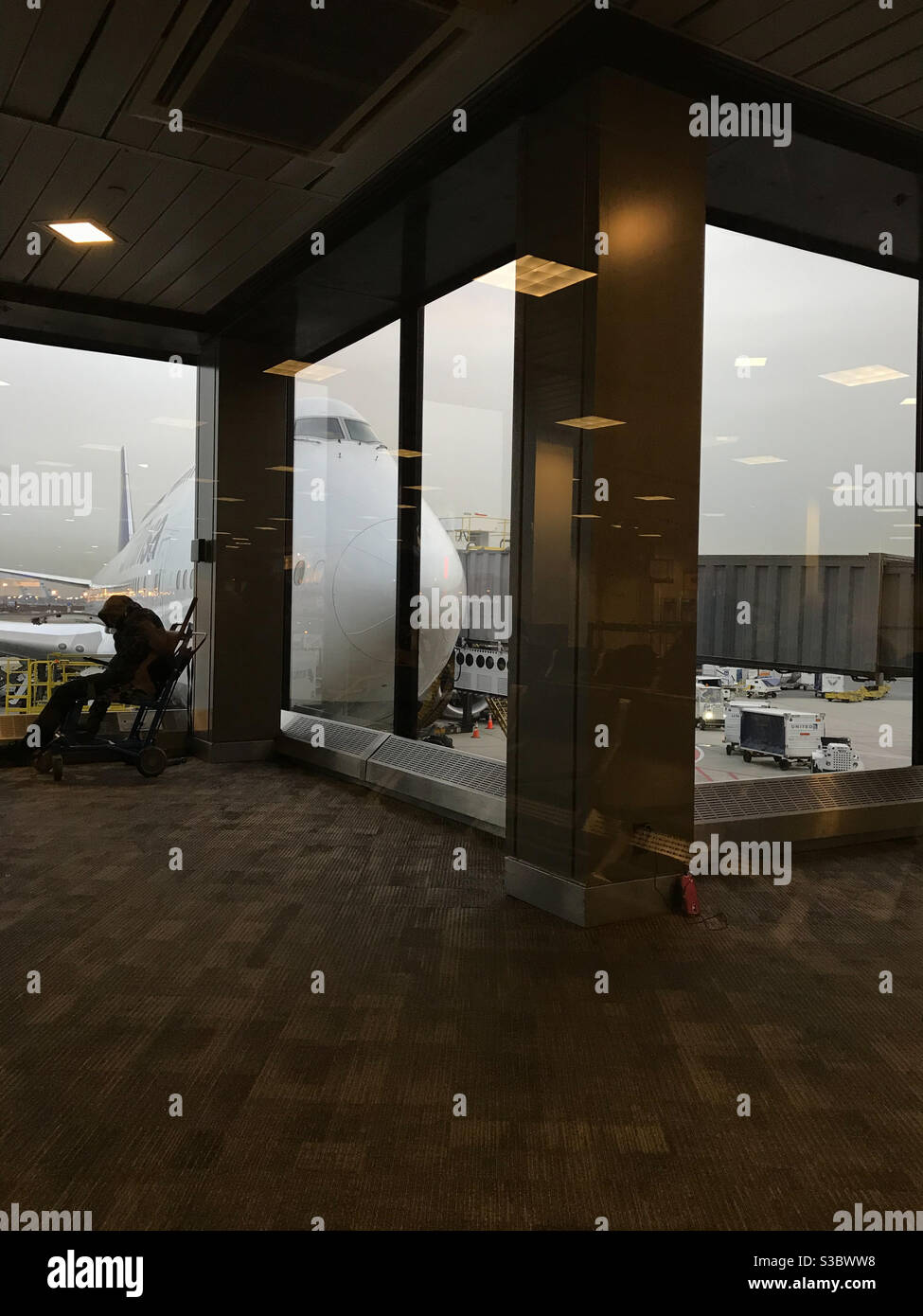 Airport departure gate Stock Photo - Alamy