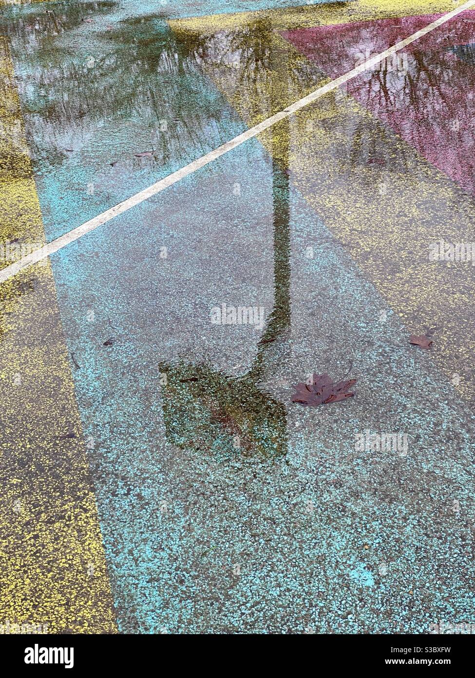 Playground reflection of basketball basket Stock Photo - Alamy