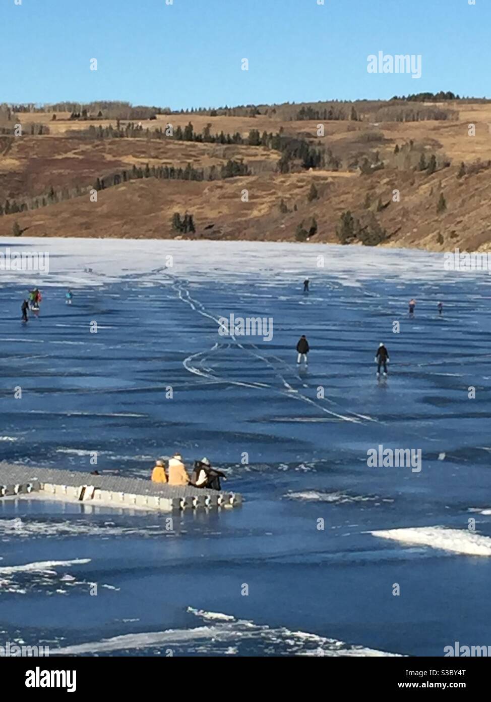 Skating on Ghost Lake, Alberta, Canada Stock Photo - Alamy
