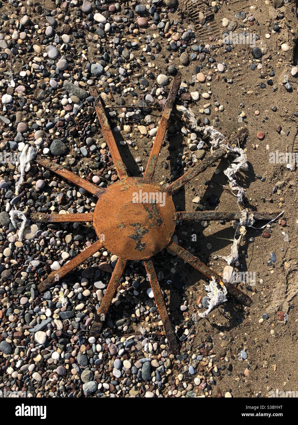 Rusty Scrap metal left on beach Stock Photo - Alamy