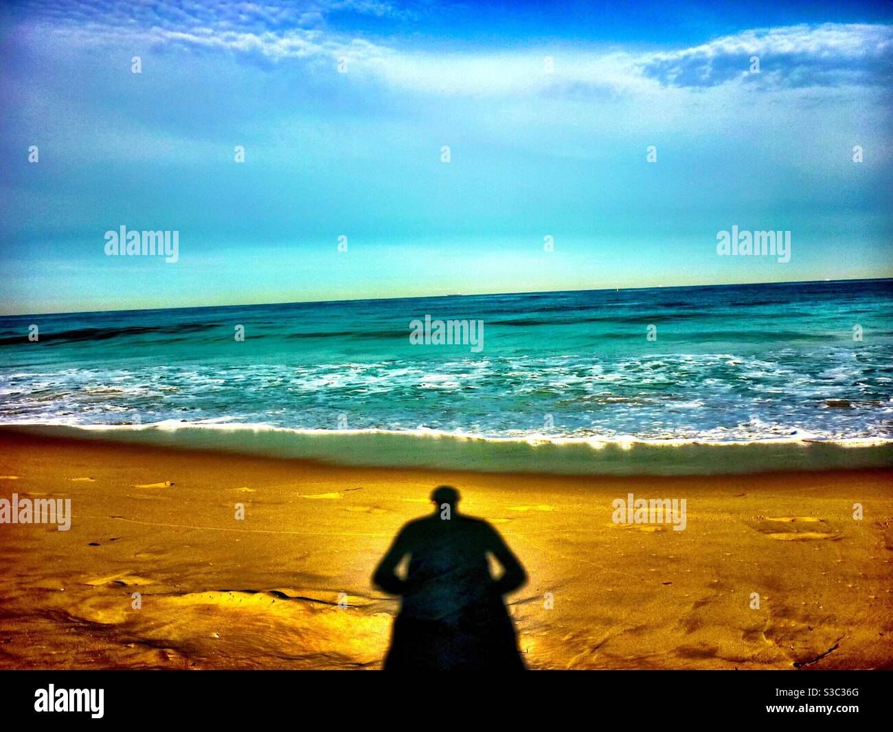 Human shadow on beach hi-res stock photography and images - Alamy