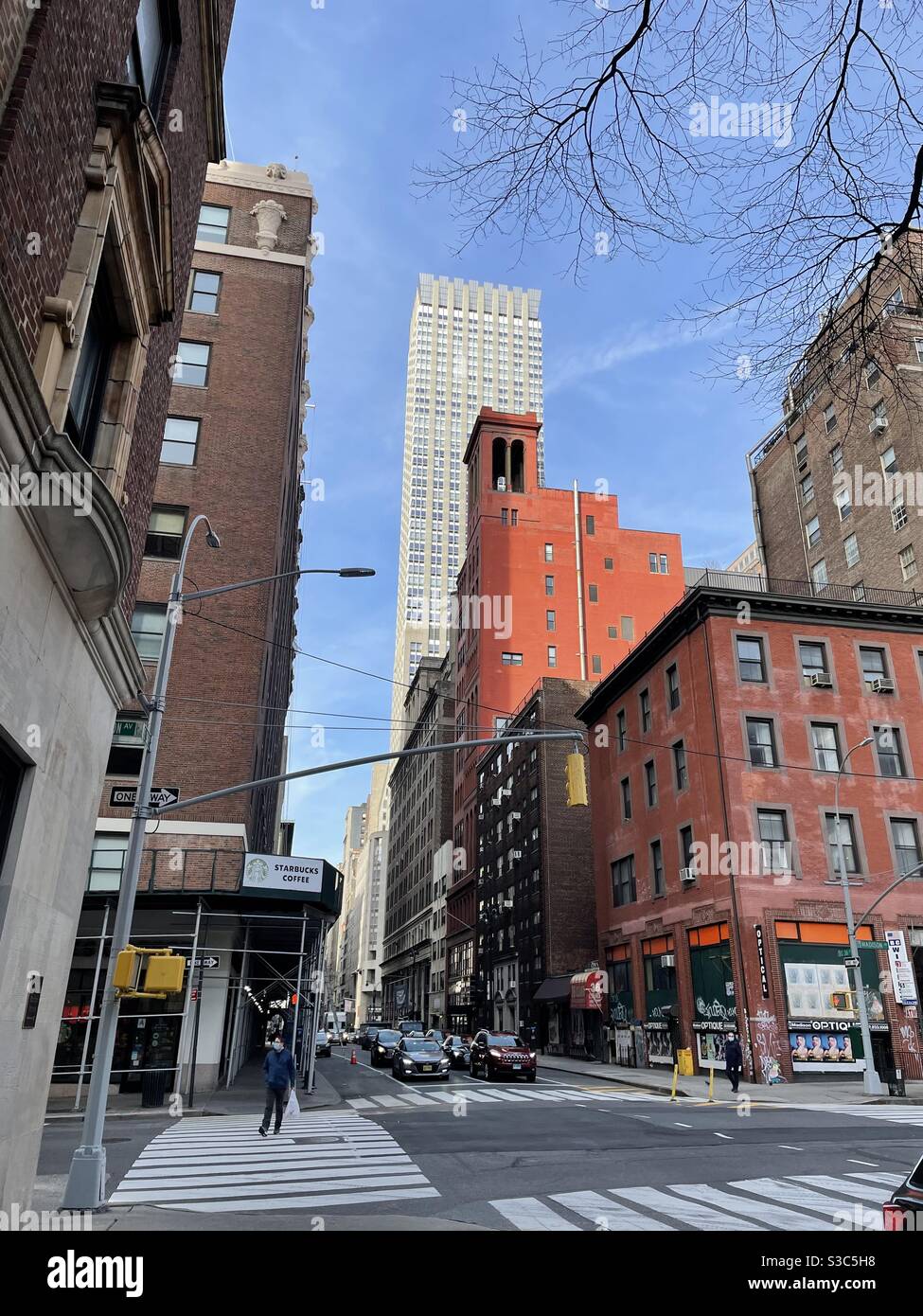 Typical New York intersection With a blend of colorful brownstone ...