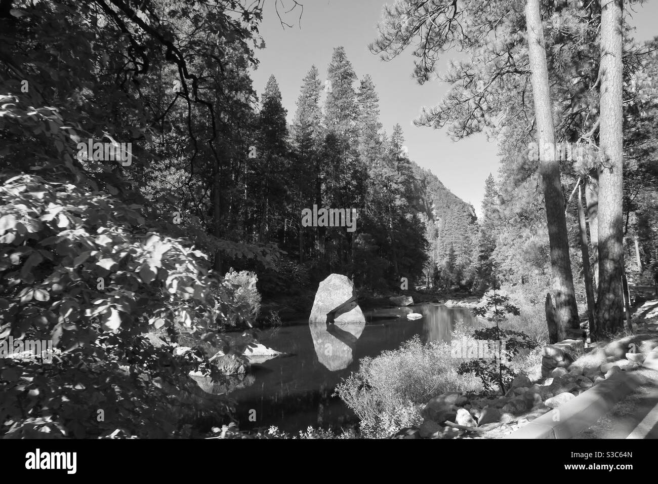Black and white dramatic photo of Merced river valley with rock ...
