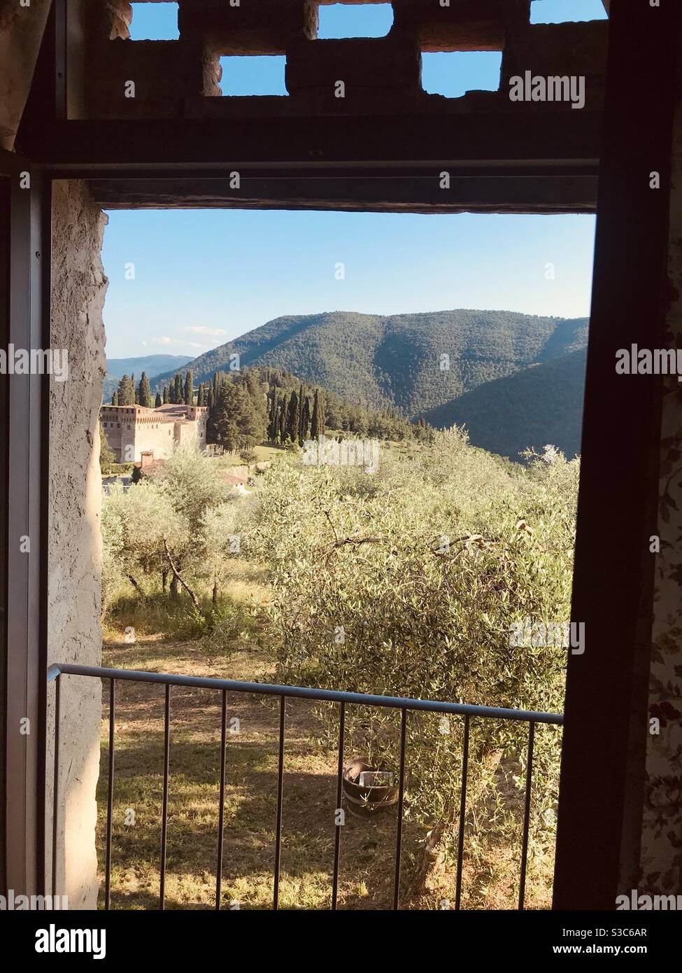 Tuscany Italy view from balcony olive trees and castle Stock Photo - Alamy
