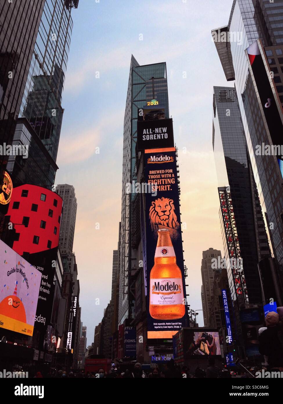 Times Square is a wash in colorful lights from electronica billboards ...
