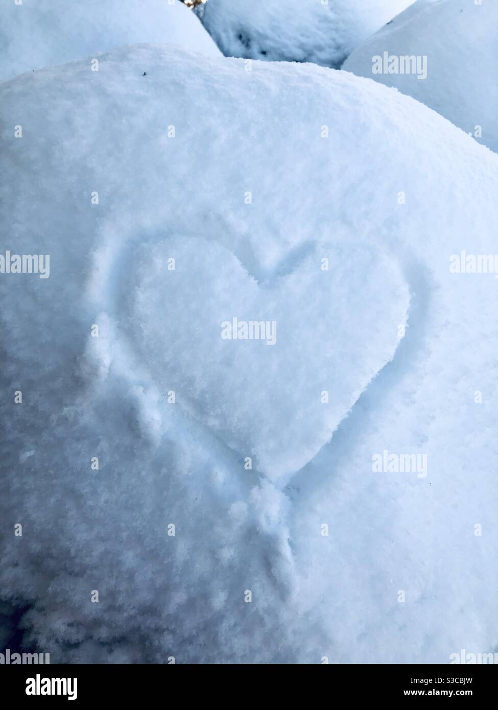 Heart of snow Stock Photo - Alamy