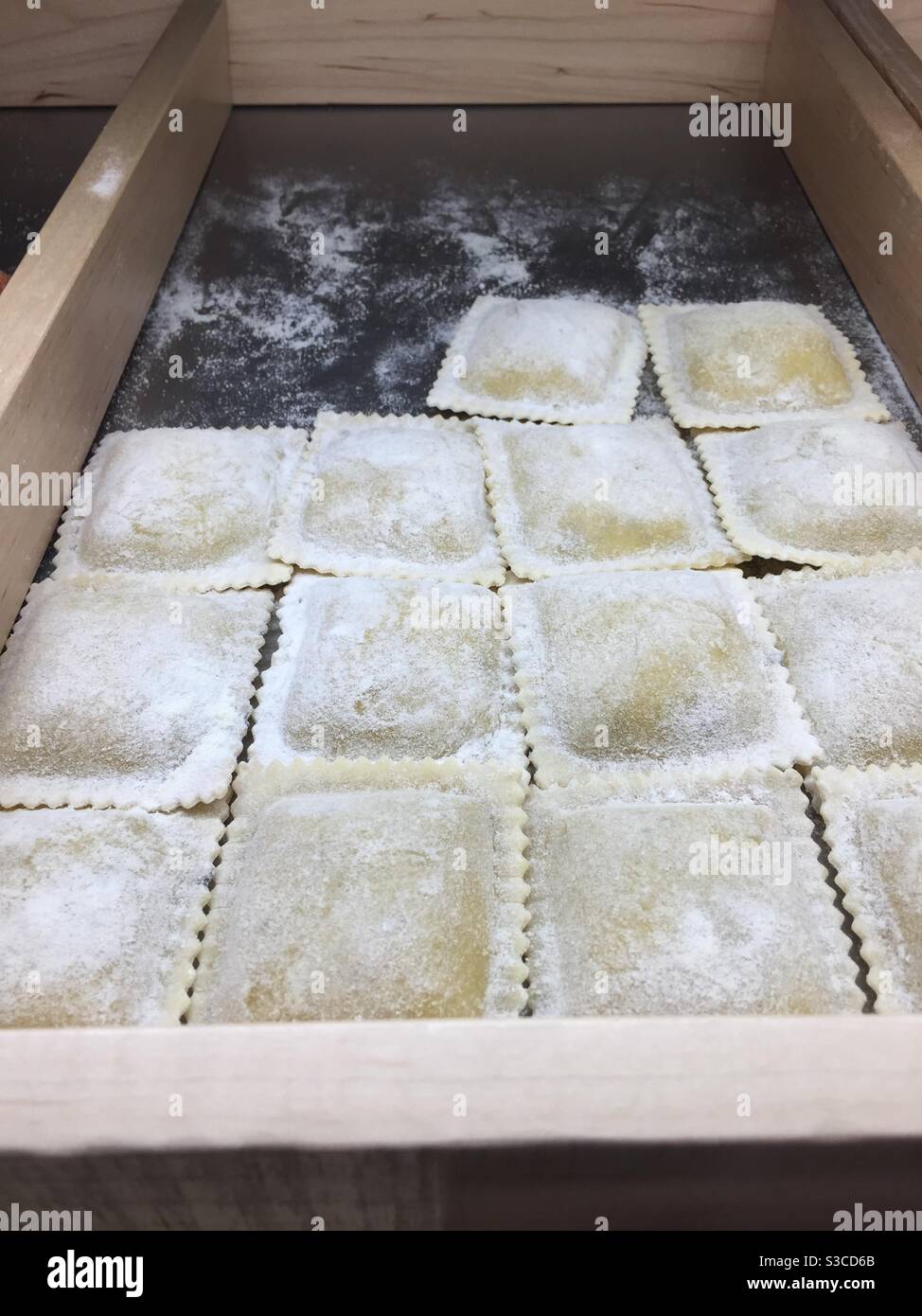 Fresh homemade ravioli on display at a grocery store Stock Photo - Alamy