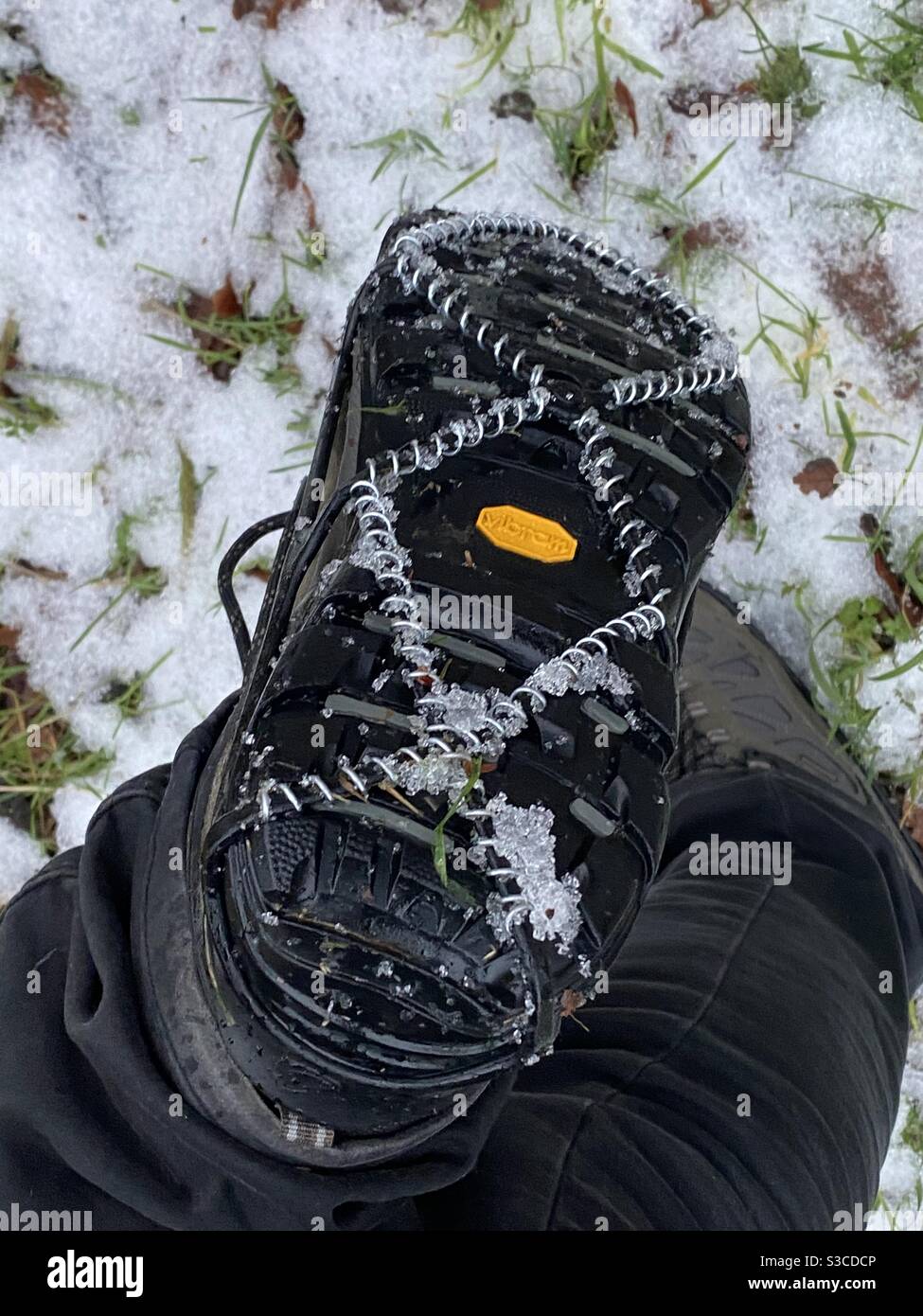 Snow and Ice Grips on boots Stock Photo - Alamy