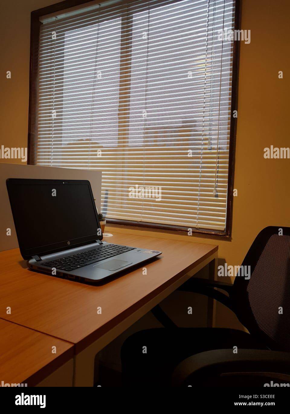 Work desk by the window Stock Photo - Alamy