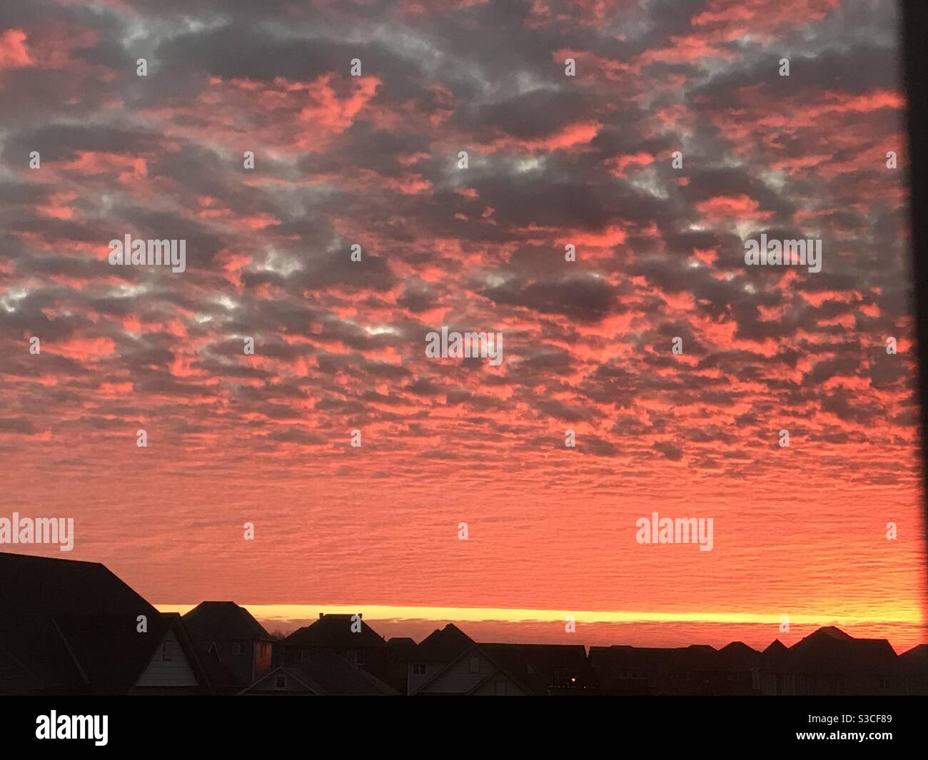 Sunset on Fire Stock Photo - Alamy