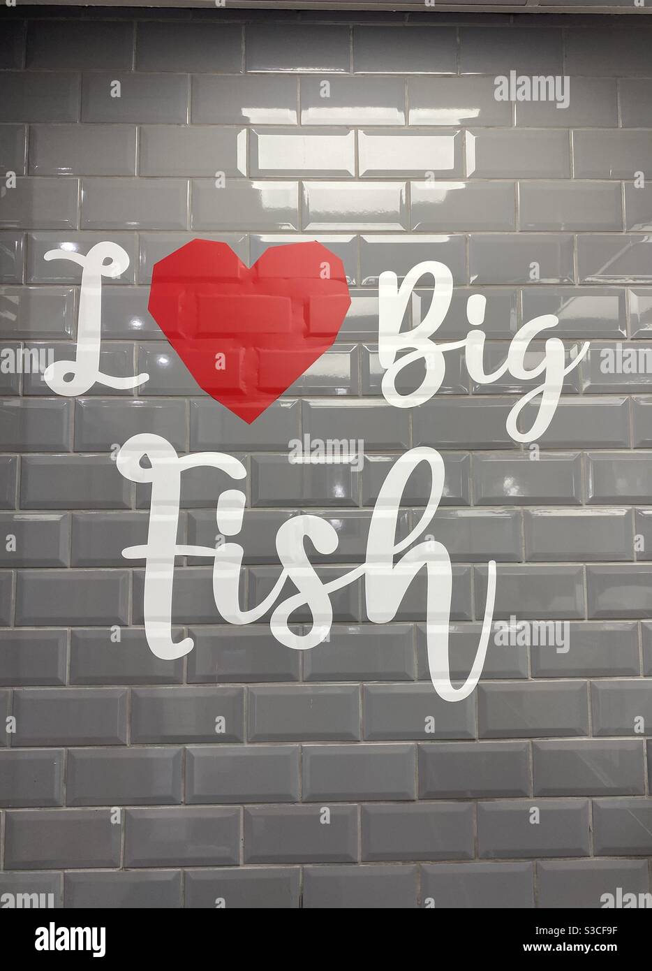 Fish and Chip shop slogan Stock Photo - Alamy