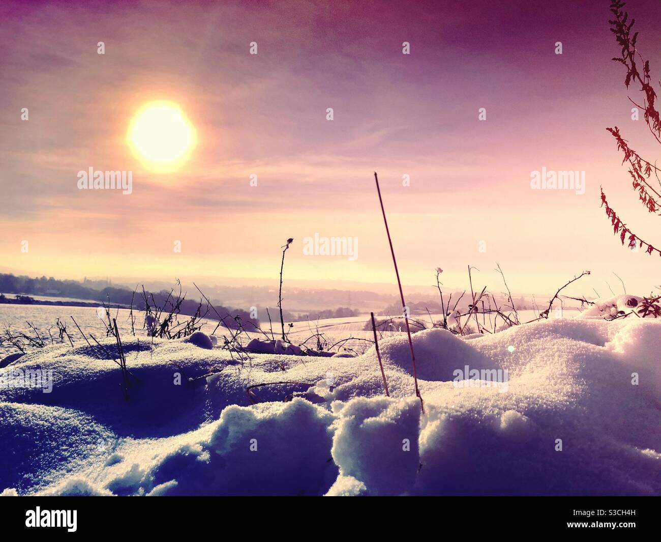 Snowy landscape with a filter applied for effect Stock Photo - Alamy